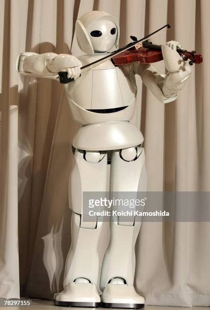 Violin Playing Robot Photos And Premium High Res Pictures Getty Images