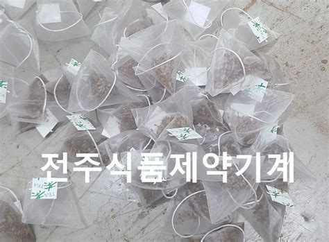 삼각티백포장기 포장기계 유전주식품제약기계