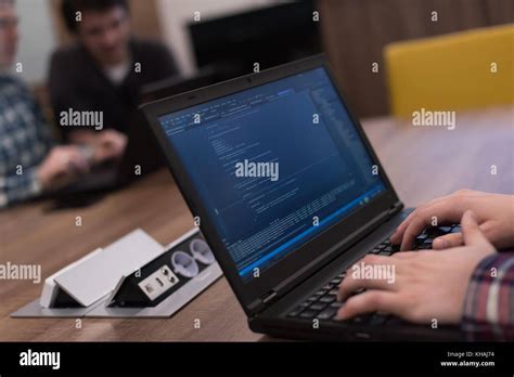 Software Developer Writing Programming Code On Laptop Computer Stock Photo Alamy