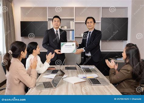 Businessman Receiving Certificate Award From His Boss In A Meeting Stock Image Image Of