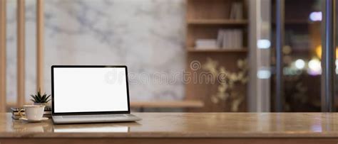 A Luxury Marble Tabletop With A Laptop Mockup In A Modern Luxury