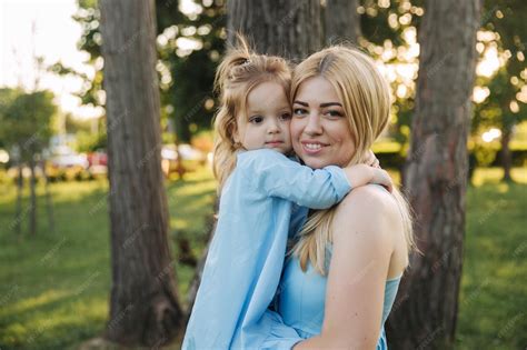 Premium Photo Young Beautiful Woman With Her Little Cute Daughter