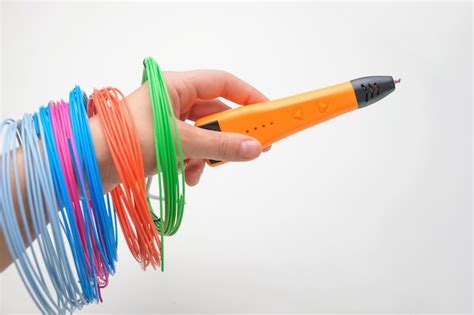 Premium Photo 3d Pen Printing With Colored Plastic Wire Filament