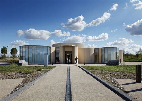 Plan 01s Crematorium Is Covered In Ribbed Concrete And Glass