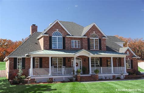 The Peppermill 1034 Wrapping A Brick Exterior With Porches Creates A