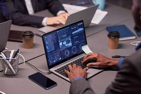 Premium Photo Businessman Typing At Laptop Keyboard With Data