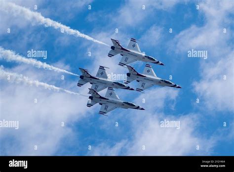 The Us Air Force Demonstration Team The Thunderbirds Fly In A 4