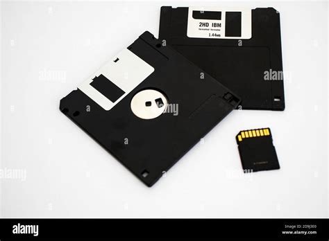 Old Floppy Disks And Memory Card On White Background Indoors Stock Photo Alamy