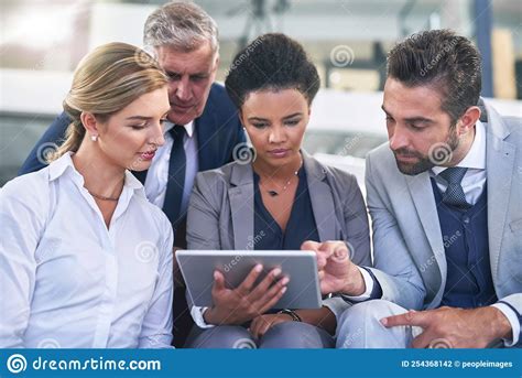 Enhancing Business By Using Digital Platforms A Group Of Businesspeople Working Together On A