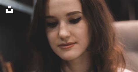 Woman Holding Mason Jar Of Drink While Reading Boojk Photo Free Human