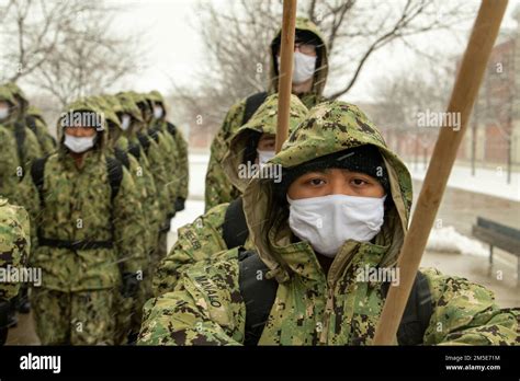 A Recruit Waits For Instruction While Her Division Reconfigures Their Formation At Recruit