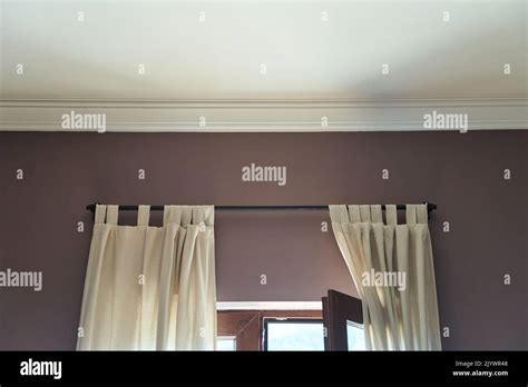 White Ceiling And Pink Wall With Part Of An Open Window And Light