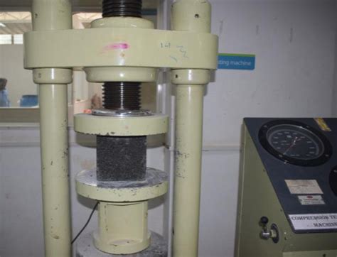 Compressive Testing Of Pervious Concrete Specimen Download Scientific Diagram Compressive Testing Of Pervious Concrete Specimen Download Scientific Diagram