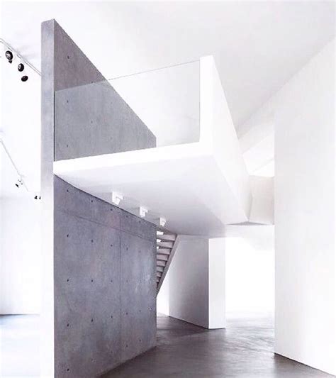 Minimalist Interior Design With Concrete Walls And Stairs