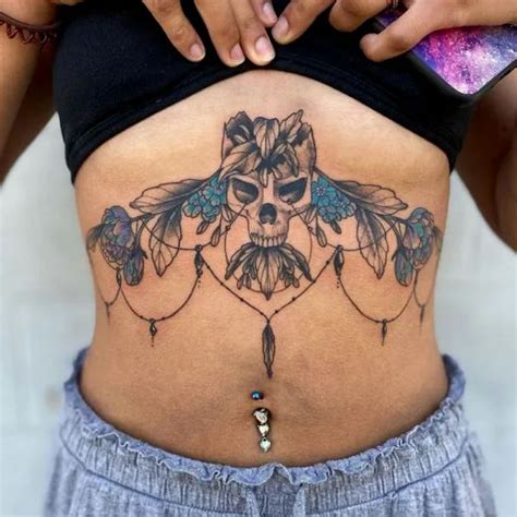 Discover A Collection Of Breathtaking Under Breast Tattoo Designs