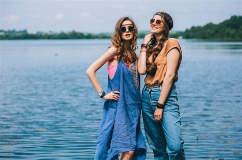 Premium Photo Two Beautiful Girl Friends On The Dock