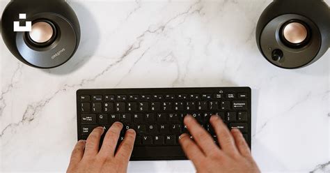 Black Computer Keyboard On White Textile Photo Free Portugal Image On Unsplash