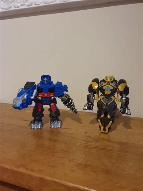 TRANSFORMERS RESCUE BOTS Modellino Dino Bot Optimus Prime E Bumblebee Raptor EUR PicClick IT