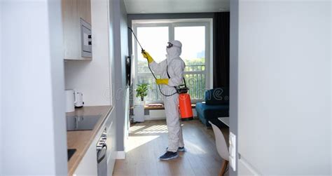 Man In Protective Suit Treating With Disinfectant Flat Stock Image Image Of Hygiene Chemical