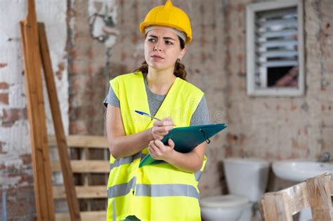 Female Architect Checking Project Documentation Stock Image Image Of Professional French