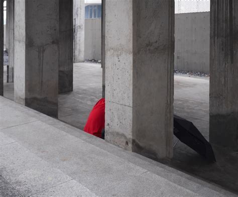 Premium Photo Rear View Of Man Hiding By Column On Street