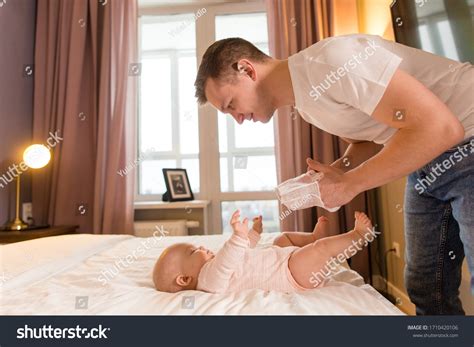 Hundred Daddy Changing Baby Royalty Free Images Stock Photos Pictures Shutterstock