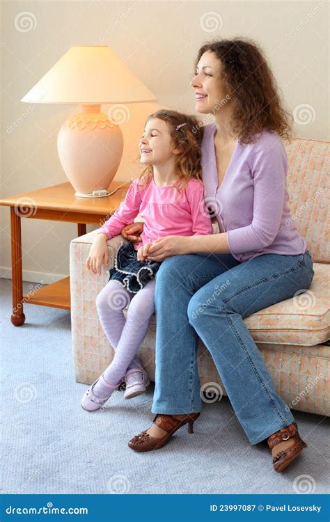 Happy Mother And Daughter Sit On Couch Stock Image Image Of Domestic