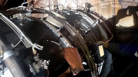 Thermography Technician Conducts Infrared Inspections Of Pipelines And Valves Assessing Heat