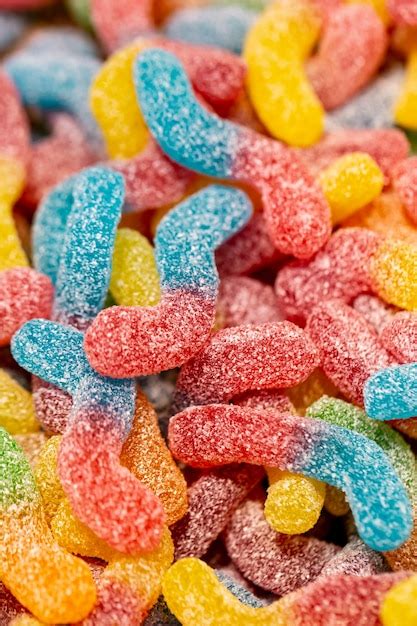 Premium Photo Chewy Candy In The Form Of Worms Covered With Sugar