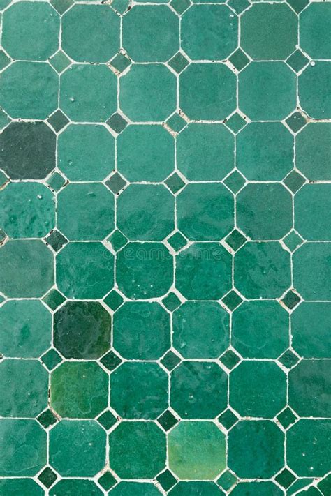 Green Ceramic Tile Floor With Geometric Octagonal And Square Pattern