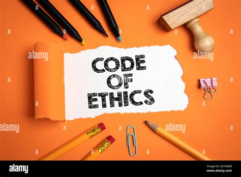 Code Of Ethics Accountability Principles Integrity And Values Text Under Torn Paper Stock