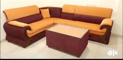 Two Model L Shape Sofa In Orange And Mehroon Colour In Starf Furniture