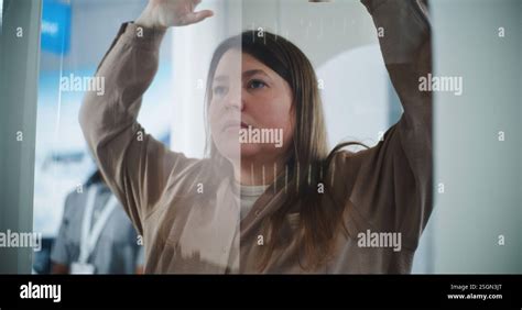 Airport Terminal Diverse People Passing Through Metal Detector Scanner Gates For Boarding Plane