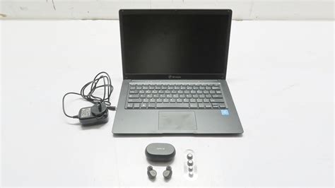 Wireless Earbuds And Modern Netbook 2 Units Wireless Earbuds And Modern Netbook 2 Units