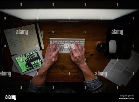 Making It Work No Matter The Hour High Angle Shot Of An Unidentifiable Computer Programmer