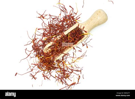 Lot Of Whole Dry Shaffron Thread With Wooden Scoop Flatlay Isolated On