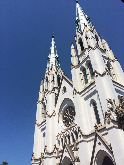 Premium Photo Low Angle View Of Clock Tower