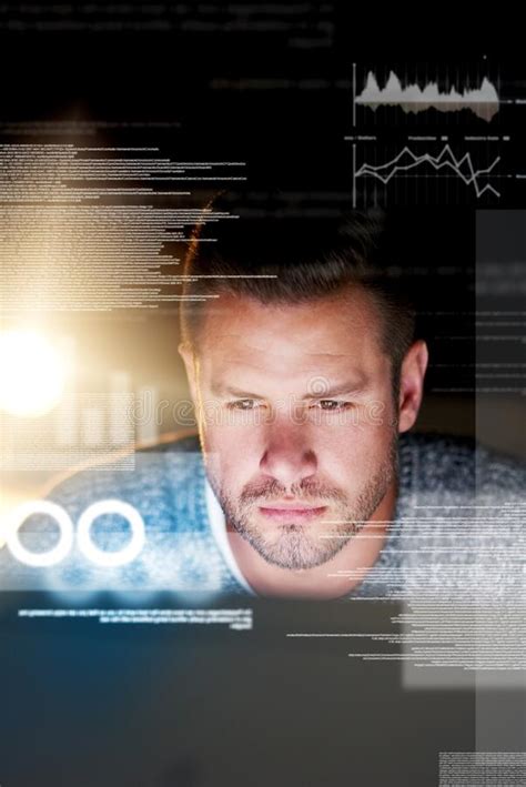 Scrutinizing The Code Shot Of A Focussed Computer Programmer Working