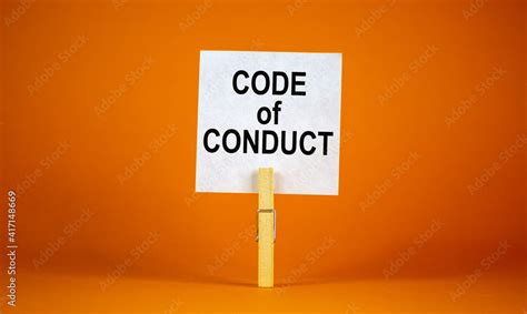 Code Of Conduct Symbol White Paper With Words Code Of Conduct Clip On Wood Clothespin