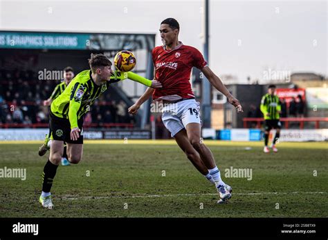 Morecambe Uk 1st Feb 2025 Finley Potter Of Fleetwood Town Fc Tangles With Morecambe Fcs