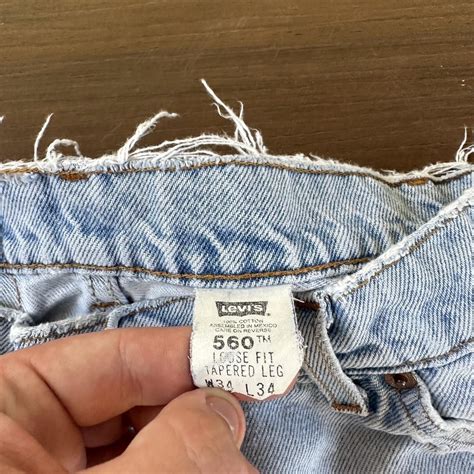 Vintage 90s Levis 560 Orange Tab Light Wash Depop