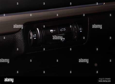 Hand Operating ESP Electronic Stability Program Control Close Up View Interior Detail Of A