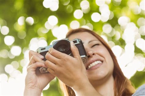 Premium Photo Pretty Redhead Taking A Photo