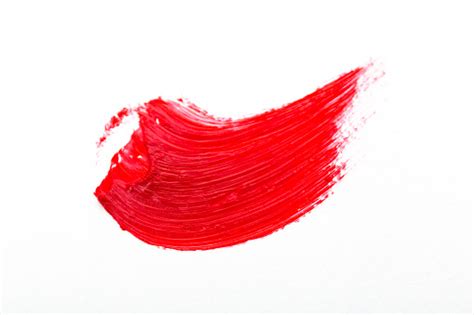 흰색 배경에 고립 된 립스틱 얼룩 얼룩 스머지 스워치 크림 메이크업 텍스처 밝은 붉은 색 화장품 브러시 스트로크 스 와이프 샘플