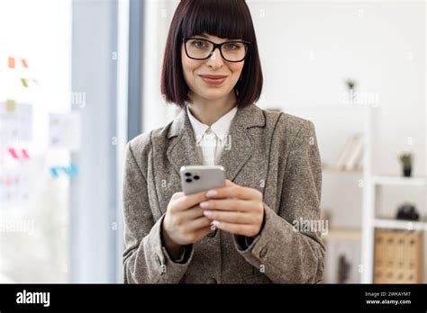 Smiling Manager In Suit Developing Electronic Communication Using