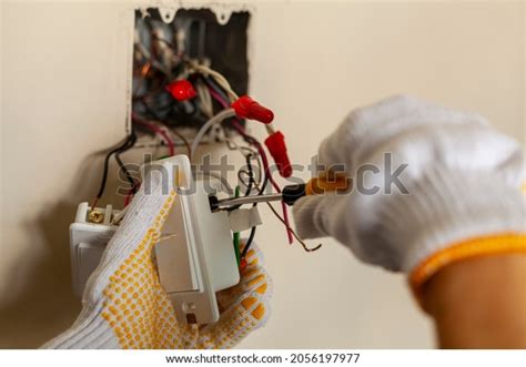 Electrician Replacing Wall Switch Diy Project Stock Photo 2056197977 Shutterstock