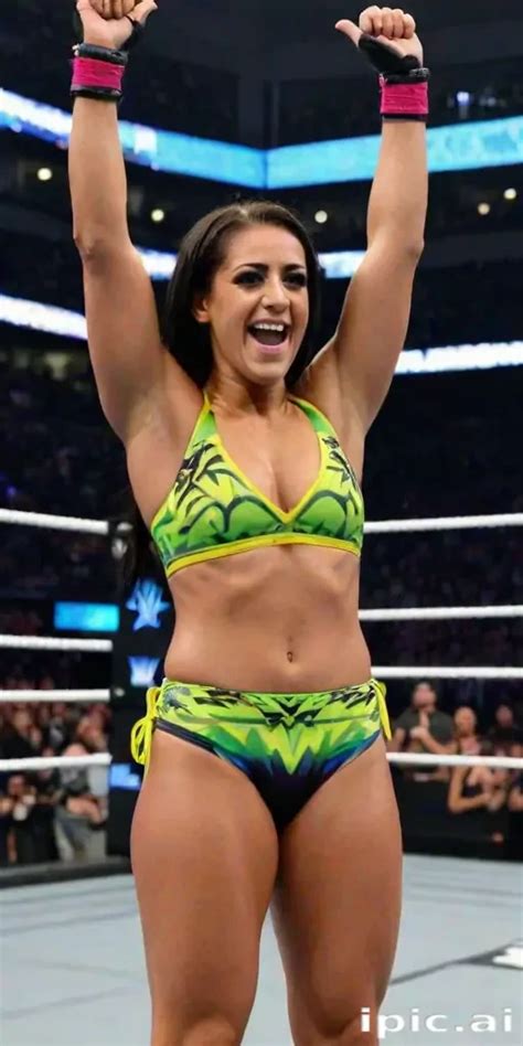 Excited Wrestler Celebrates Victory With Enthusiastic Thumbs Up Gesture