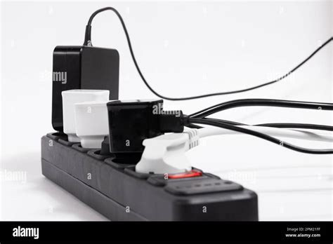 Black Extension Cord With Red Power On Off Button And Many Plugs Stock Photo Alamy