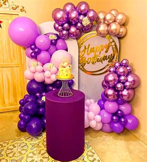 ببینید انواع تزئین بادکنک تولد با تم بنفش و صورتی