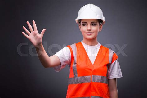 The Cute Construction Worker Pressing Virtual Buttons Stock Image